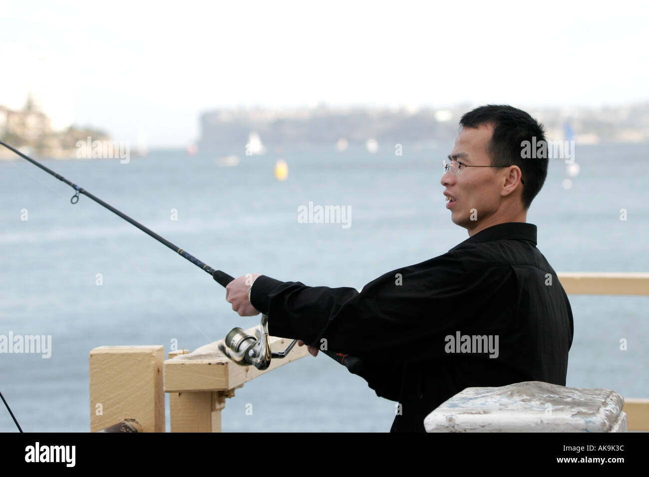 Asian fisherman in Sydney Australia Stock Photo - Alamy