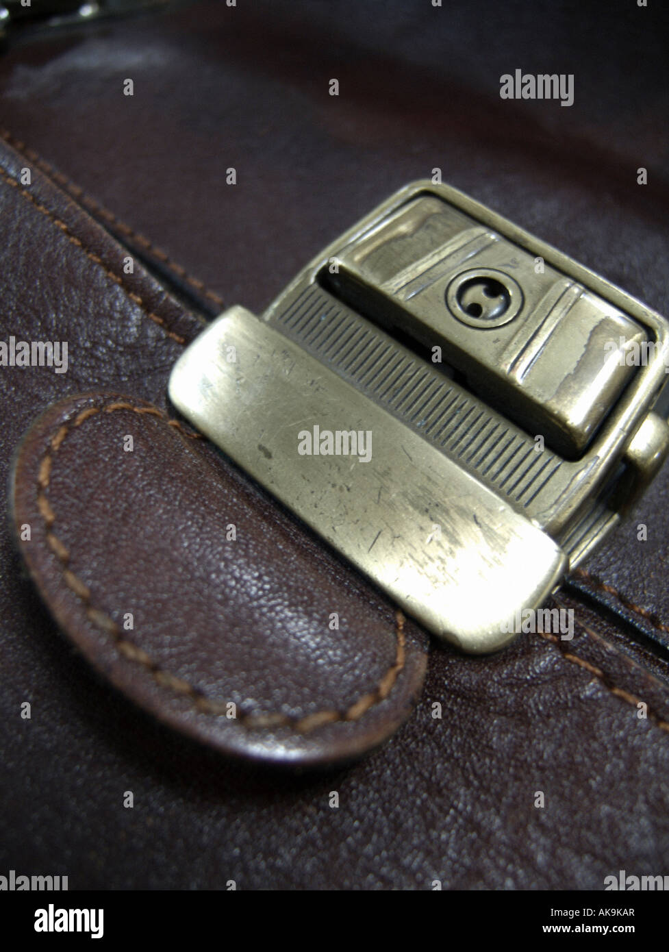 Closeup of a leather handbag s fastener Stock Photo - Alamy