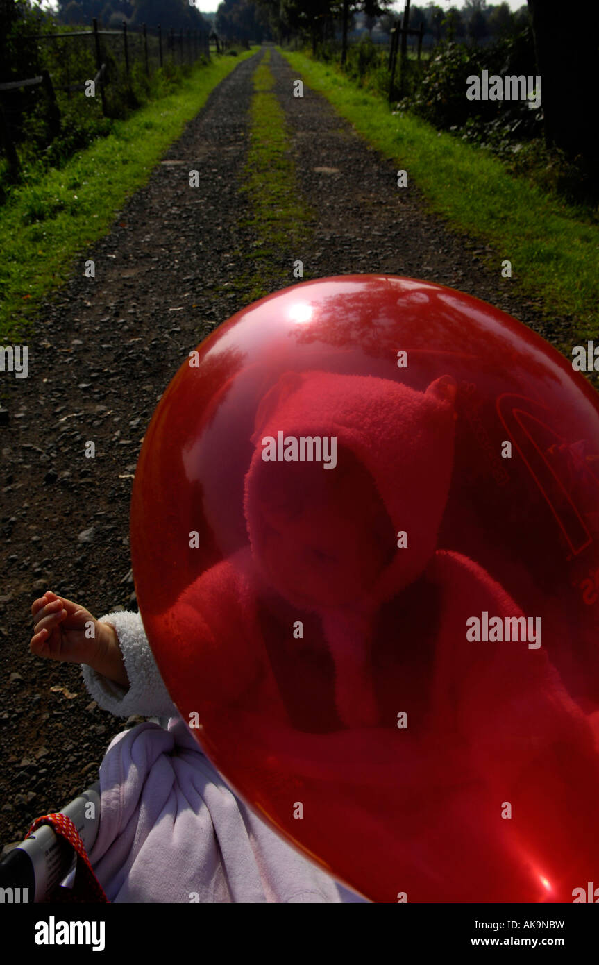 baby red balloon face portrait Stock Photo - Alamy