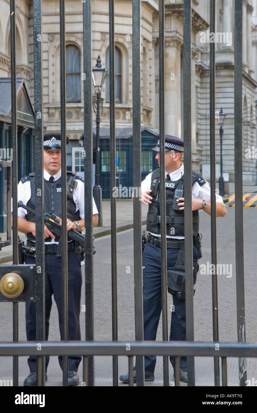 Armed police inside the gates of Downing Street London England Stock ...