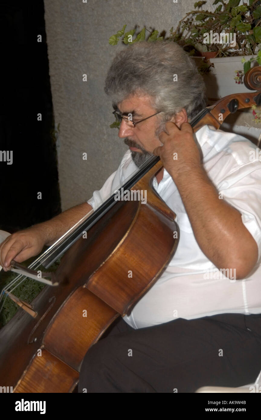 Man male cellist cello musician playing hi-res stock photography and ...