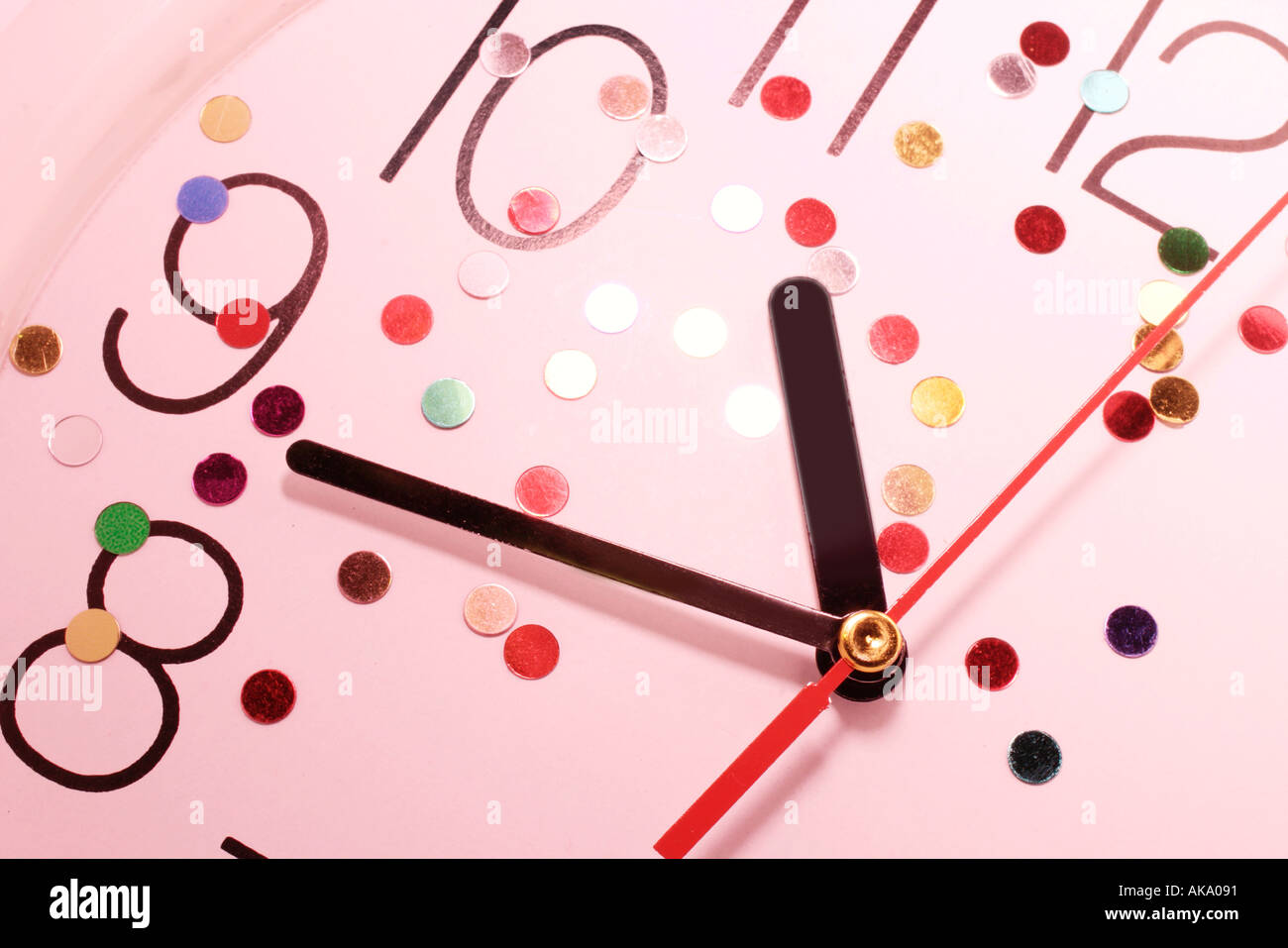 Confetti on Clock Stock Photo - Alamy