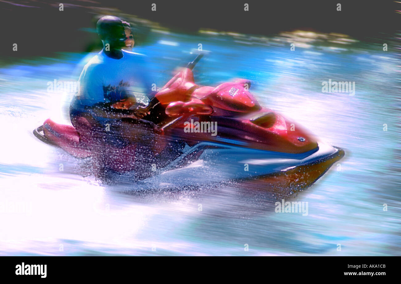 Jet Ski Fun in the tropics Stock Photo - Alamy