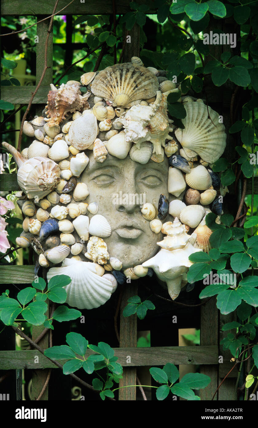 shell and face sculpture Stock Photo - Alamy