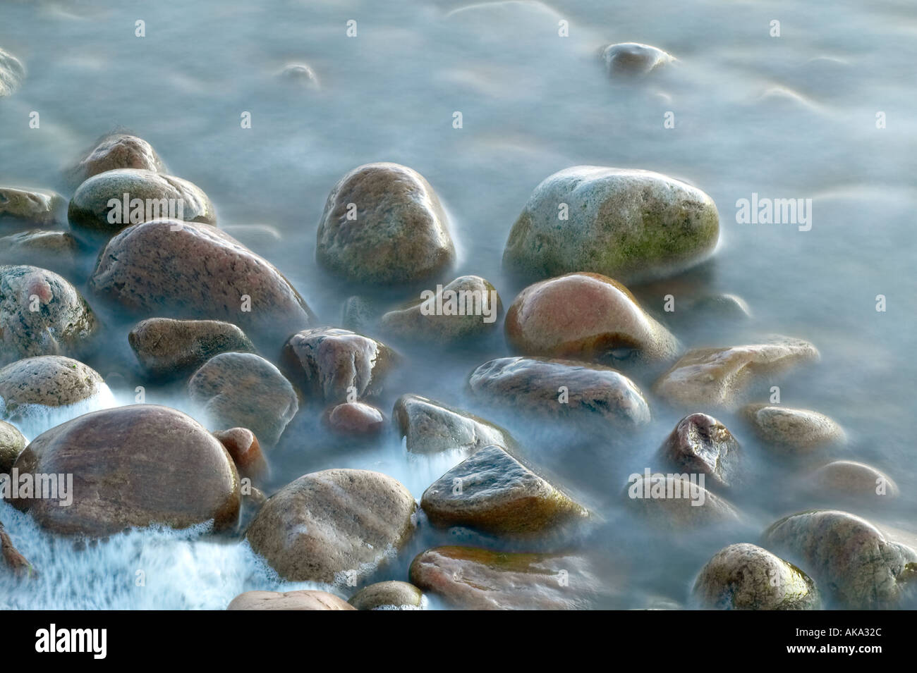stones in water Stock Photo - Alamy