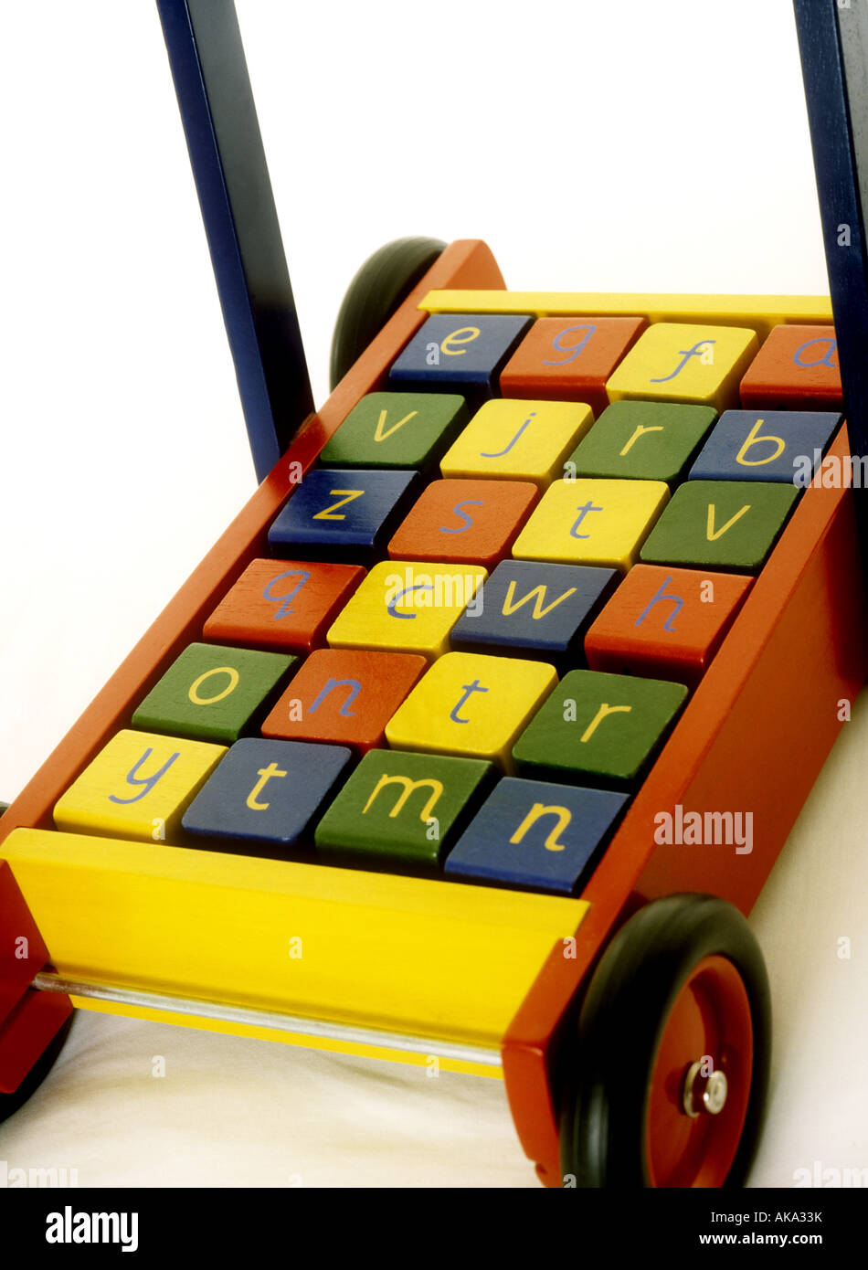Close-up of child's alphabet bricks in toy cart Stock Photo - Alamy