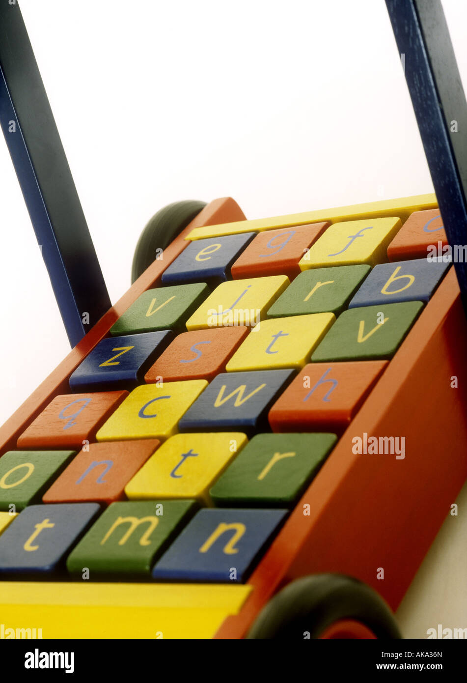 Close-up of child's alphabet bricks in toy cart Stock Photo - Alamy