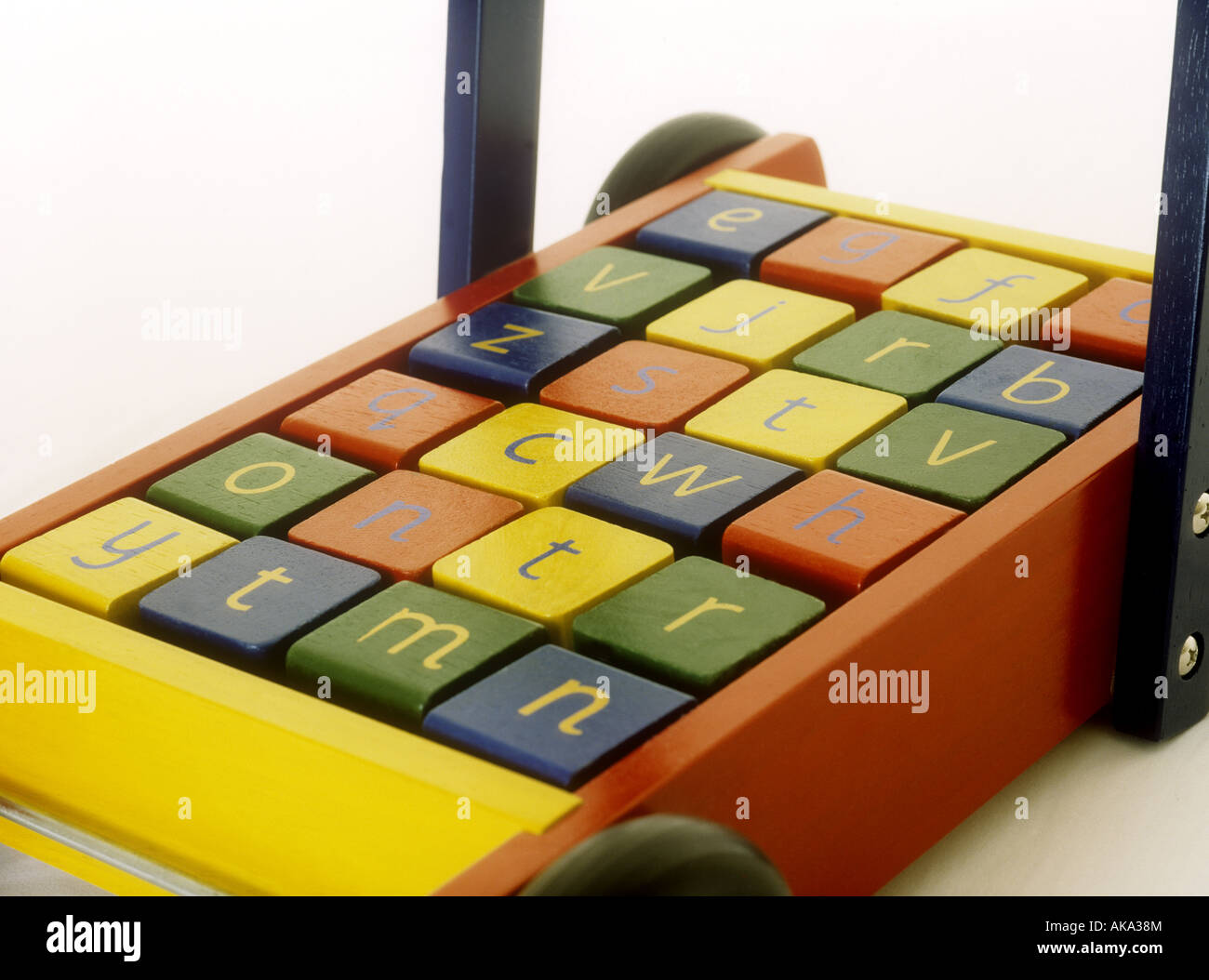 Close-up of child's alphabet bricks in toy cart Stock Photo - Alamy