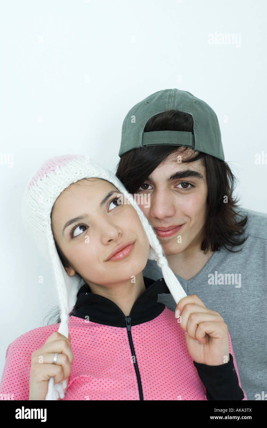 Young couple wearing hats, portrait Stock Photo - Alamy