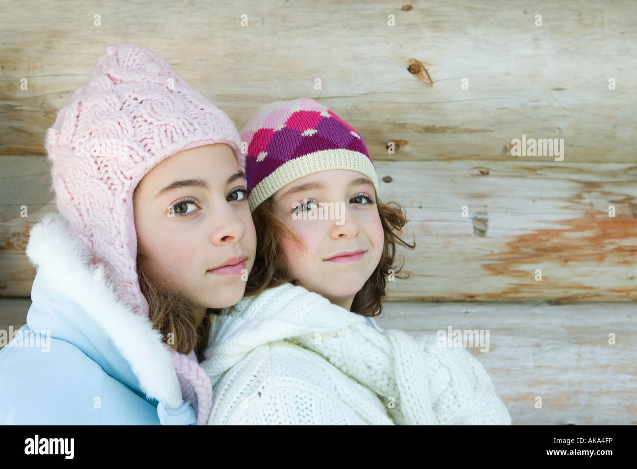 Two young friends smiling at camera, portrait Stock Photo - Alamy