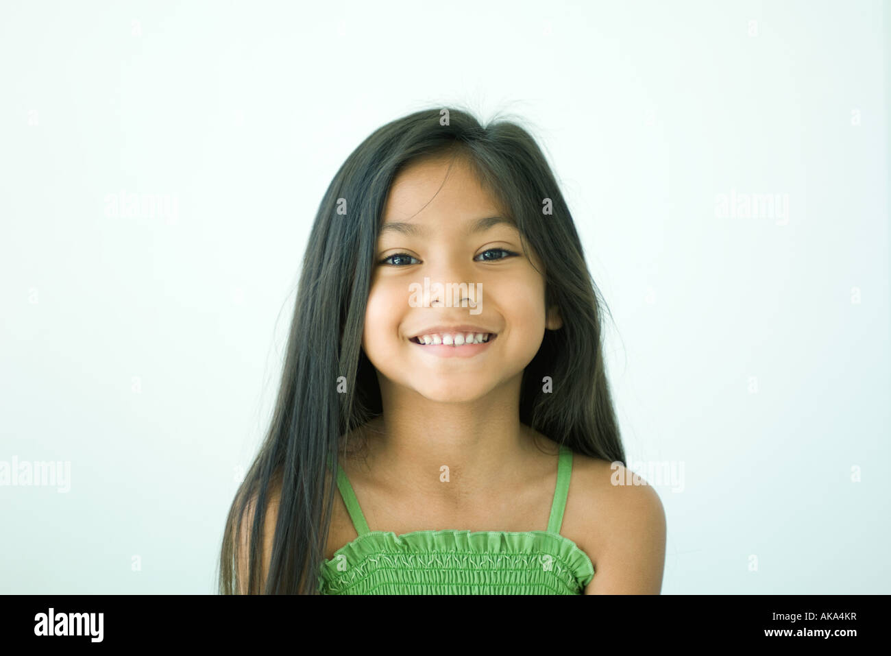 Girl smiling at camera, portrait Stock Photo - Alamy