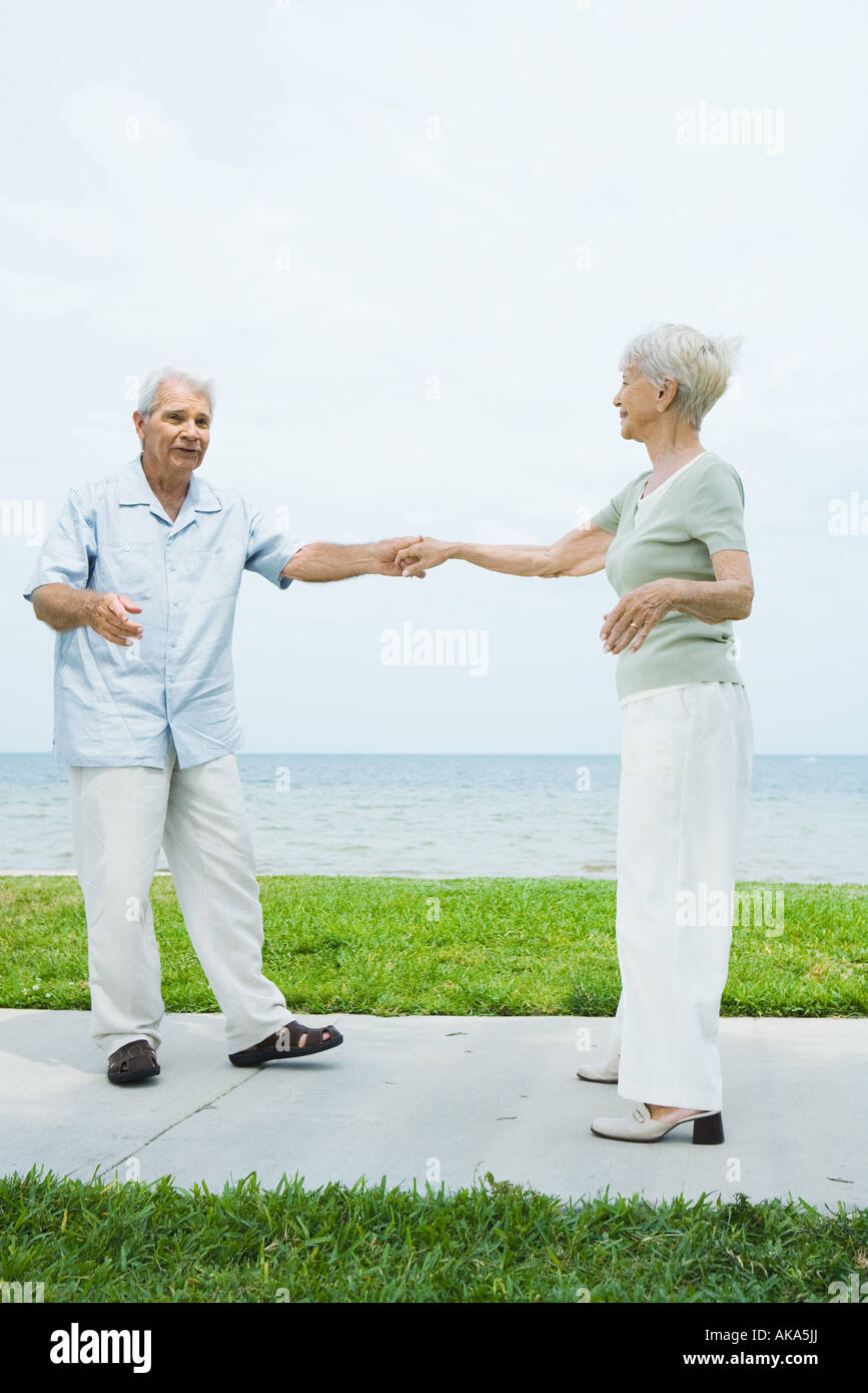 Two senior woman dancing full body hi-res stock photography and images ...