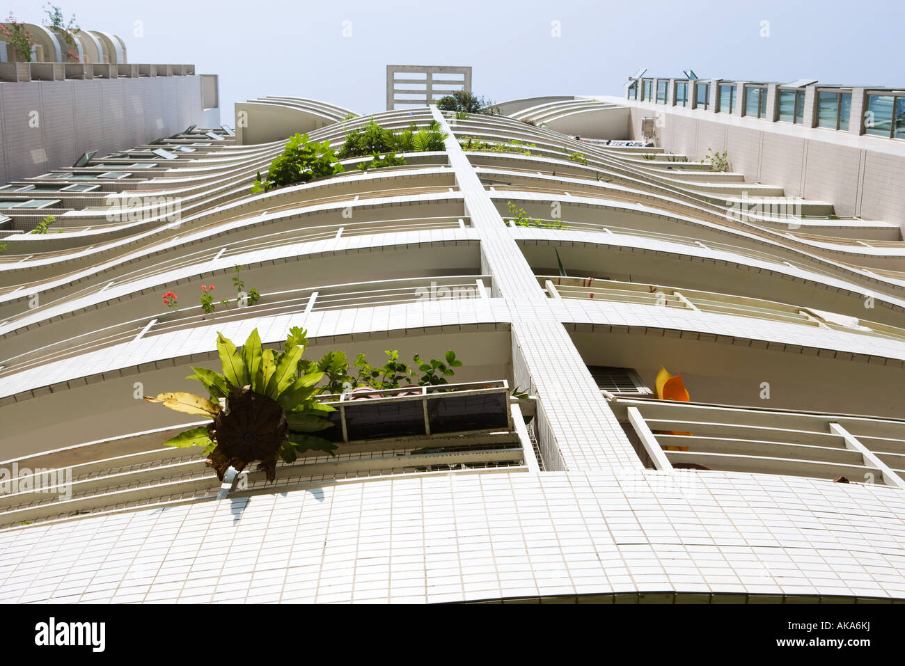 Balconies on high rise apartment building, low angle view Stock Photo ...