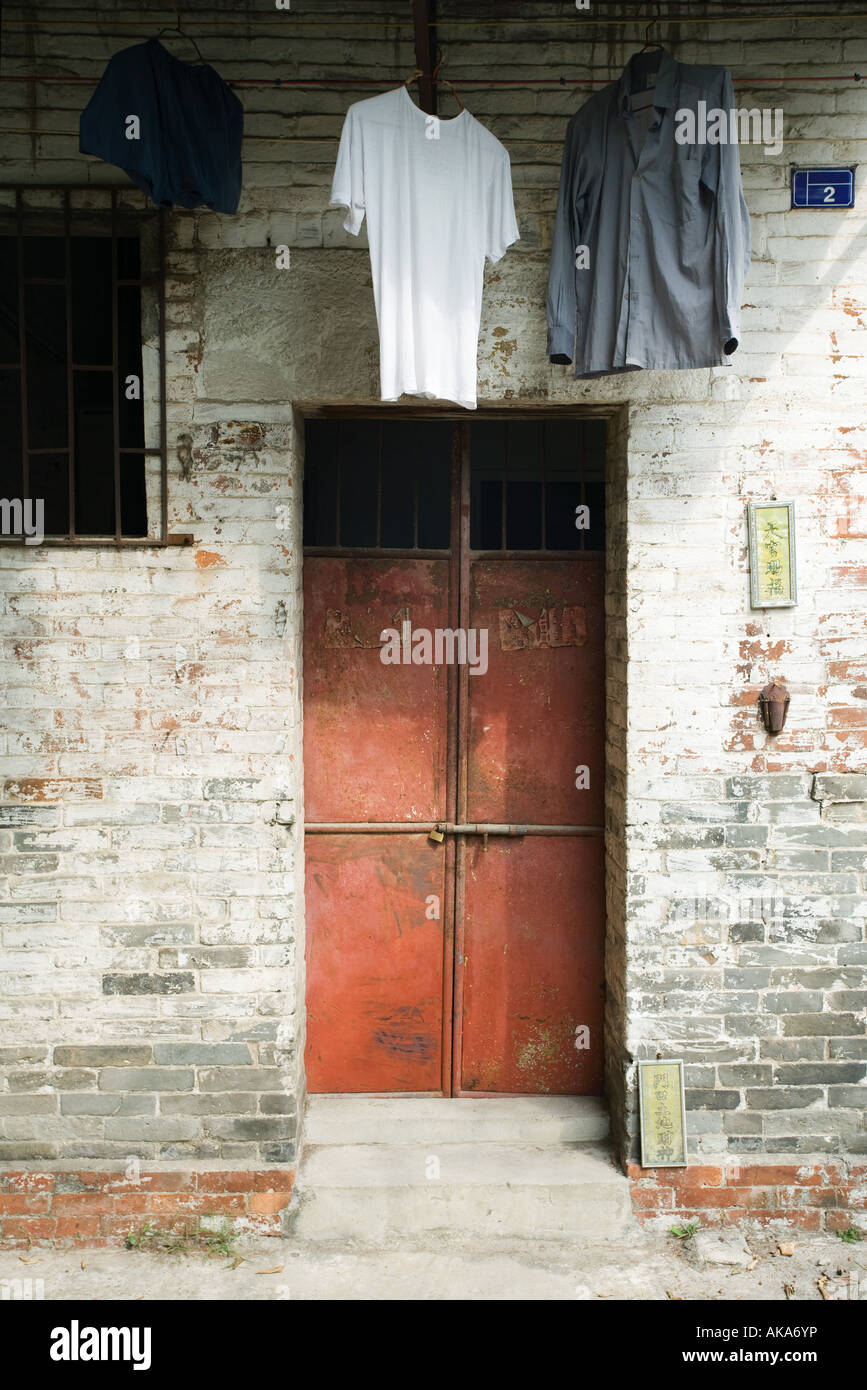 Clothes hanging over door hi-res stock photography and images - Alamy