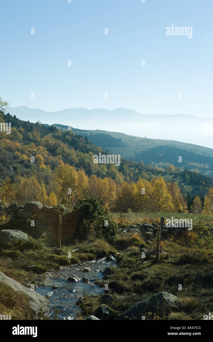 Mountain landscape with stream Stock Photo - Alamy