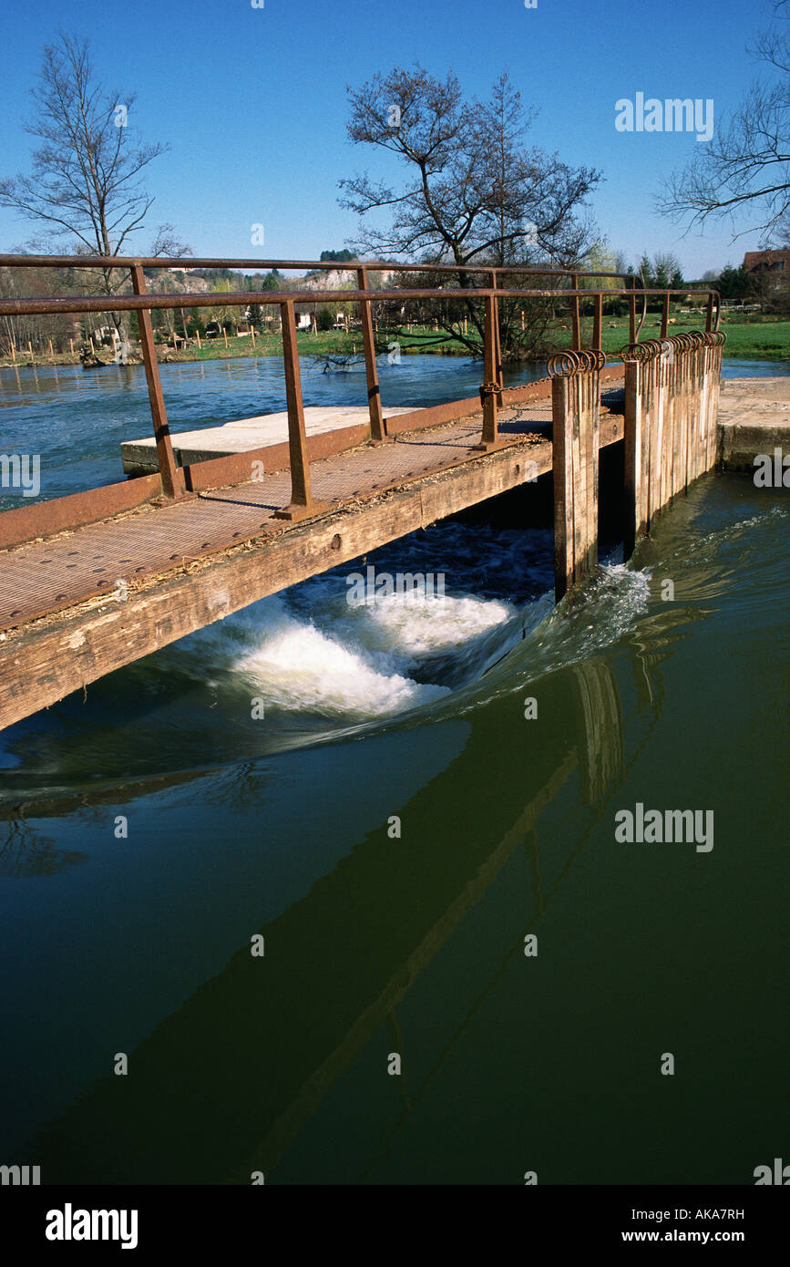 Sluice in rural landscape Stock Photo - Alamy