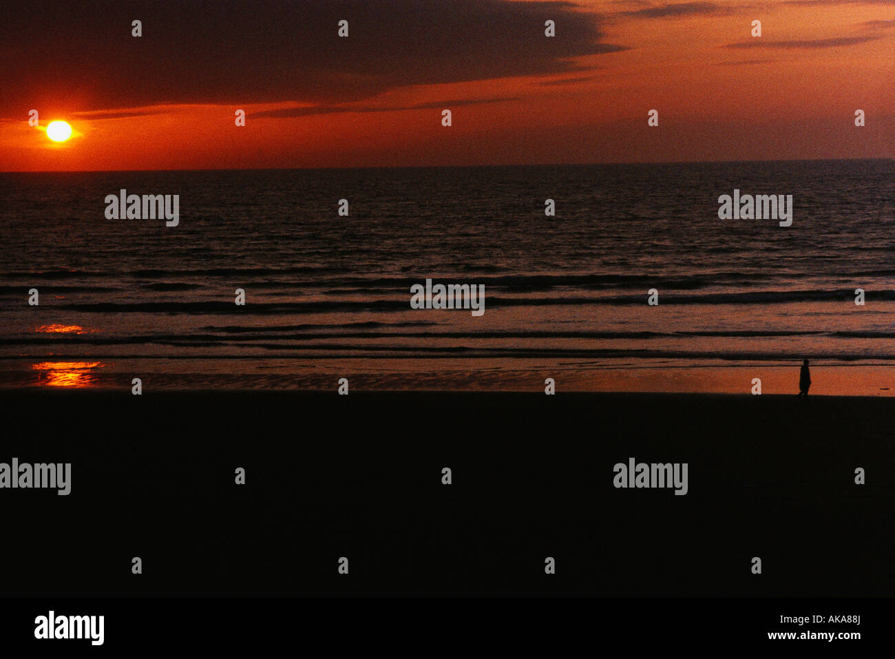 Sunset over ocean Stock Photo - Alamy