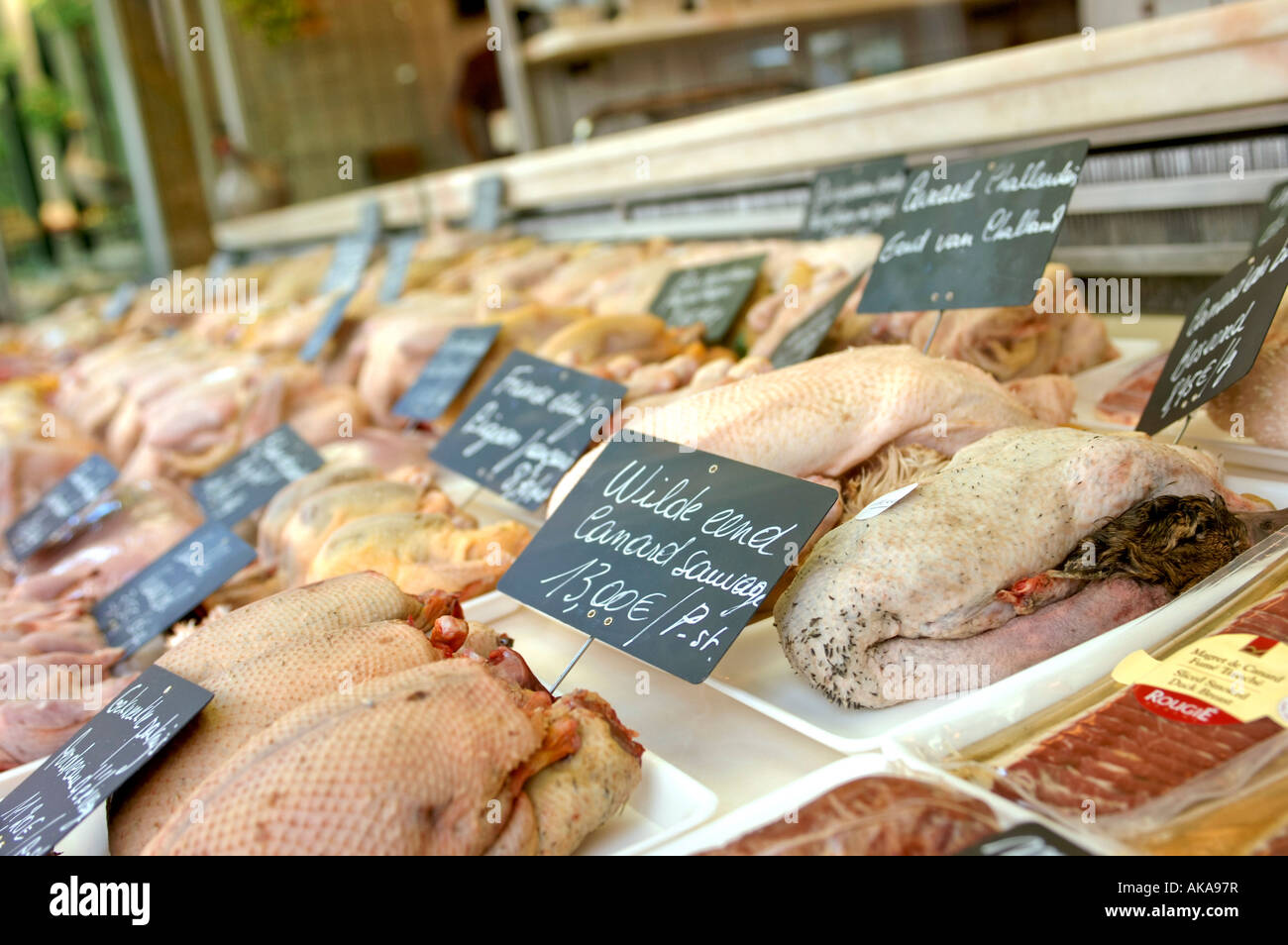 Butchers shop display showing prepared poultry Stock Photo - Alamy