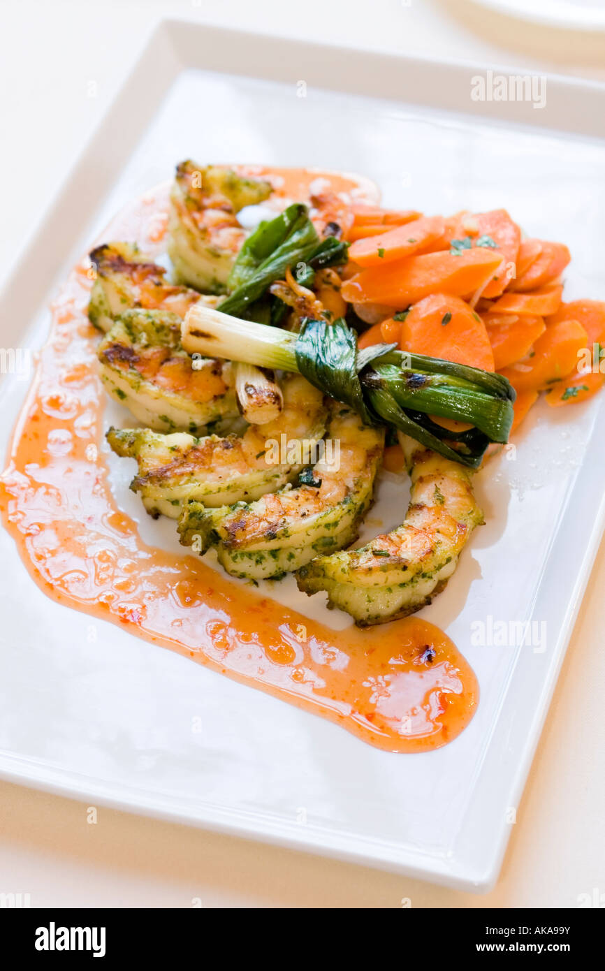 A dish of prawns with vegetables on plate Stock Photo - Alamy