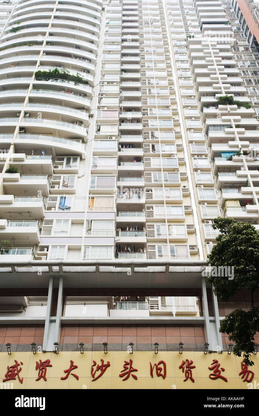 China, Guangdong Province, Guangzhou, facade of high rise apartment ...