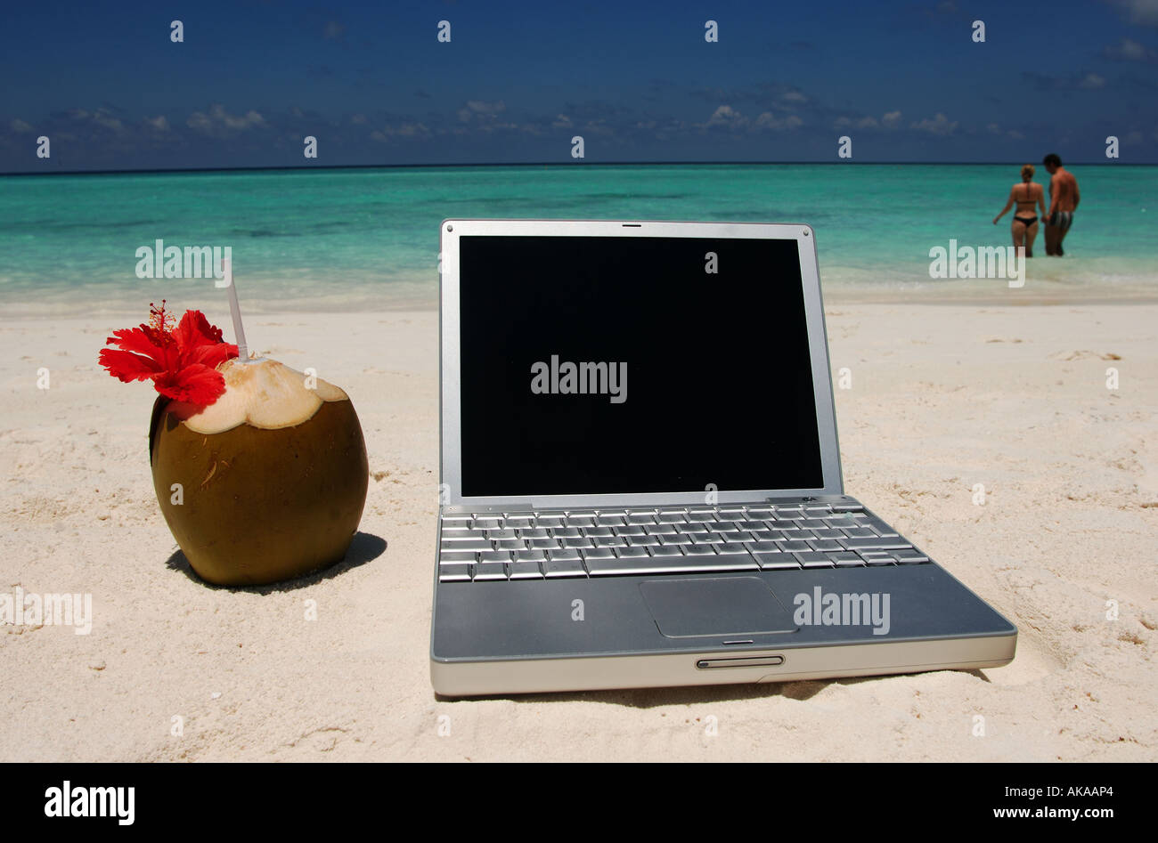 Maldives laptop on beach Stock Photo - Alamy