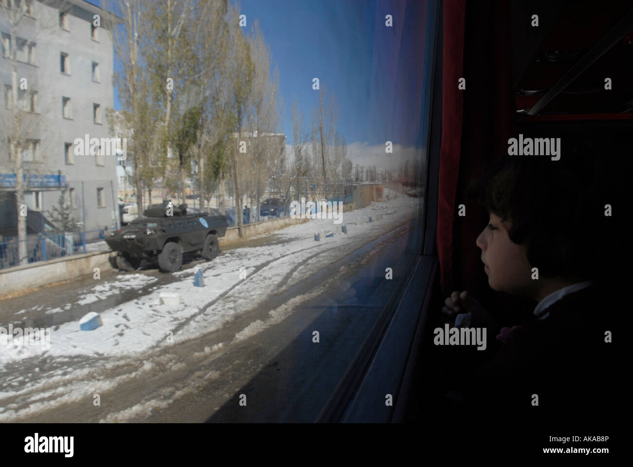 A Young Kurdish Girl Watches The Turkey Countryside Roll By From A Bus