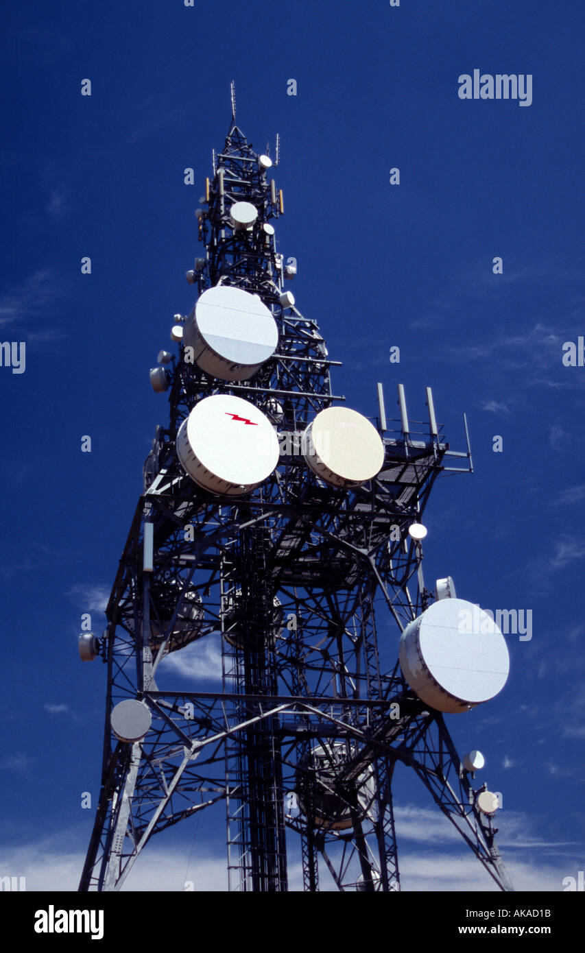 Communications tower heavily loaded with antennas Stock Photo - Alamy
