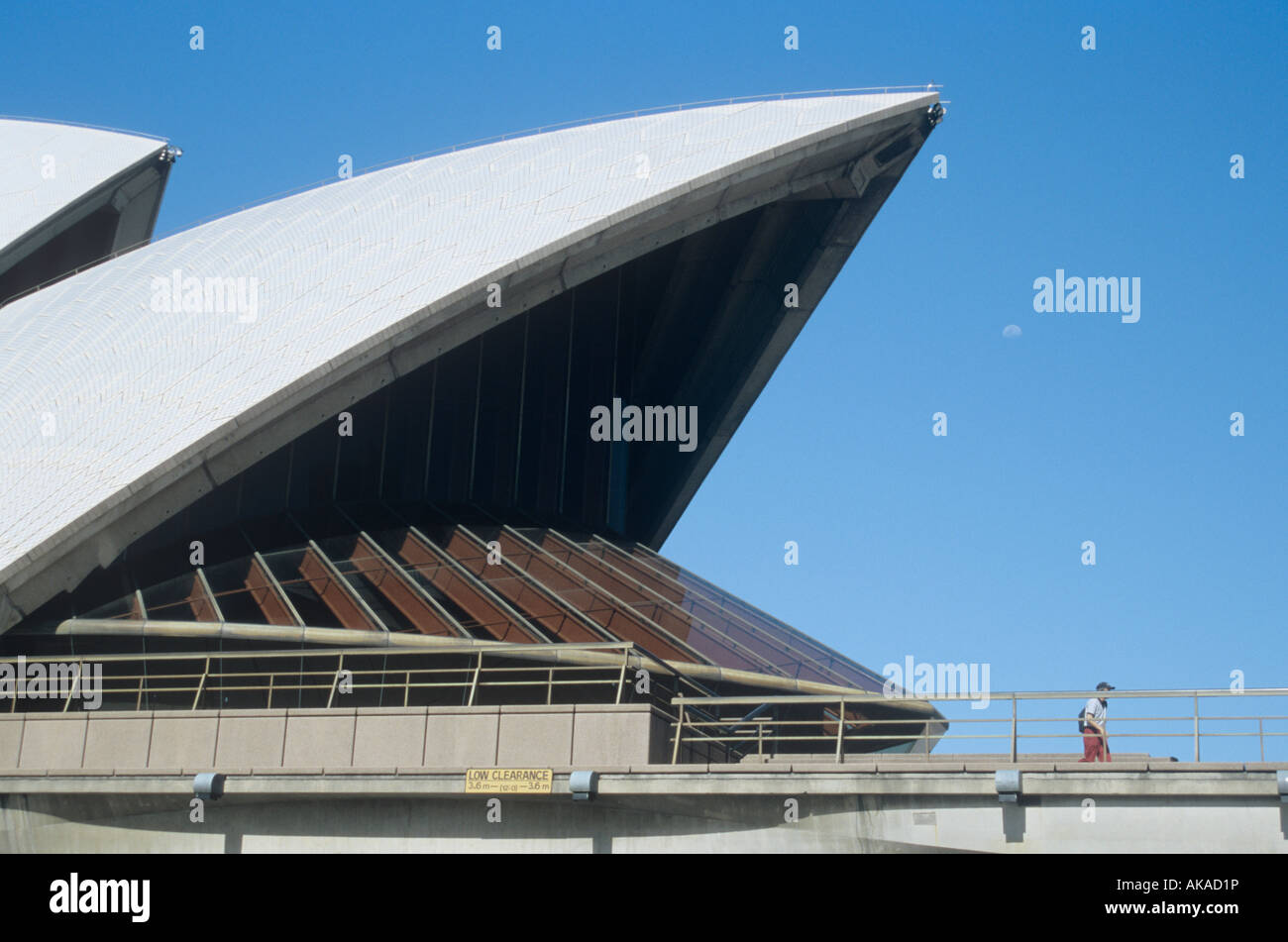 Sydney Opera house side view blue sky moon Stock Photo - Alamy