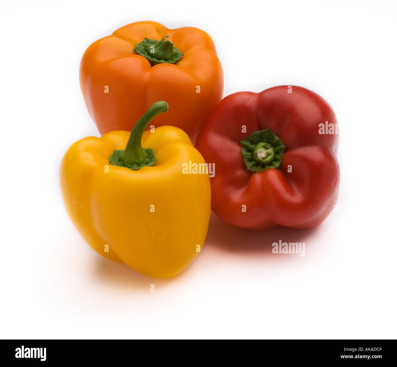 Three different colored peppers Stock Photo - Alamy