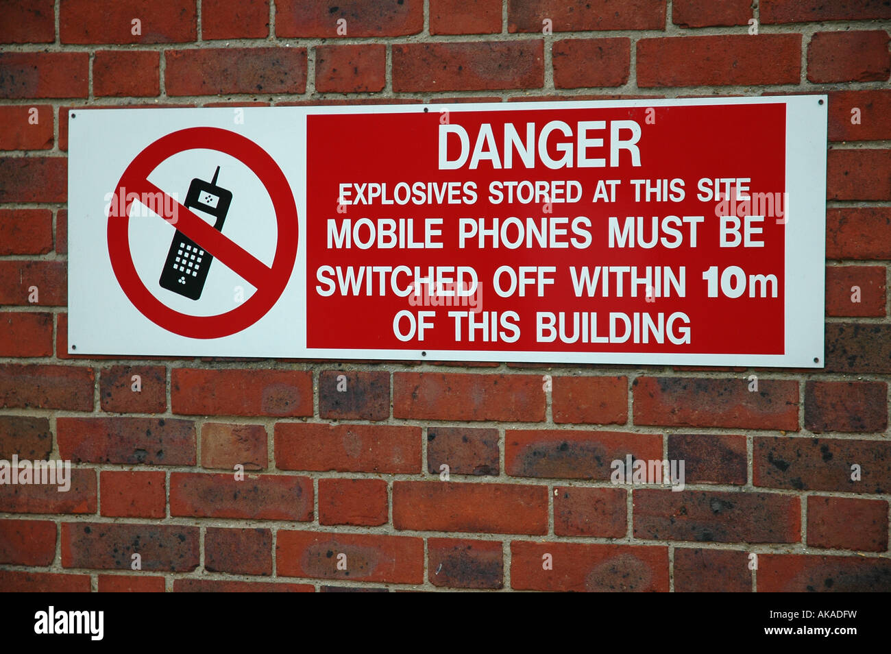 warning sign mobile telephone danger explosives Stock Photo - Alamy