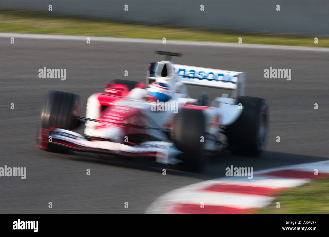 Olivier Panis driving his Toyota Formula One Racecar on the racetrack ...