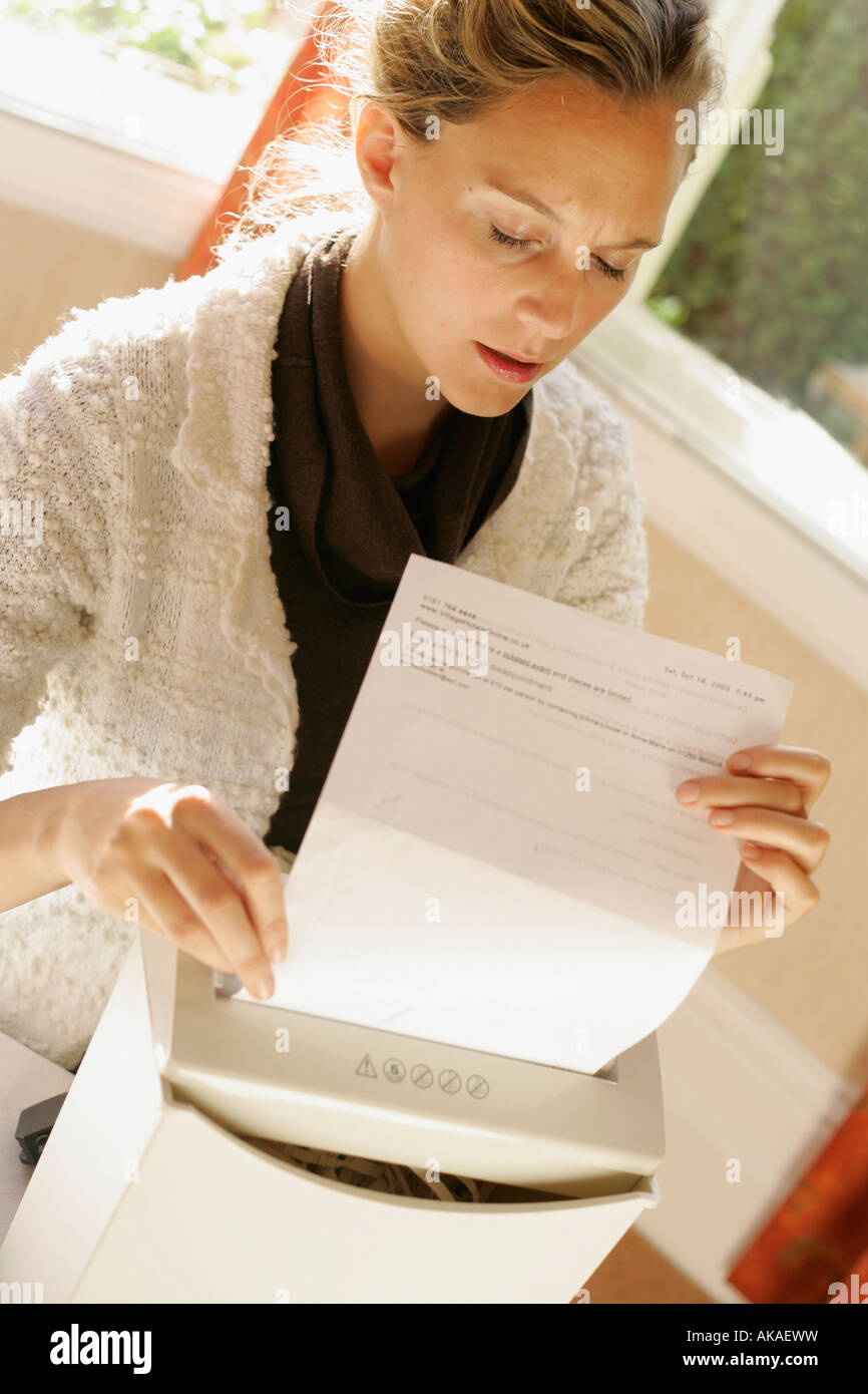 woman using shredder Stock Photo - Alamy