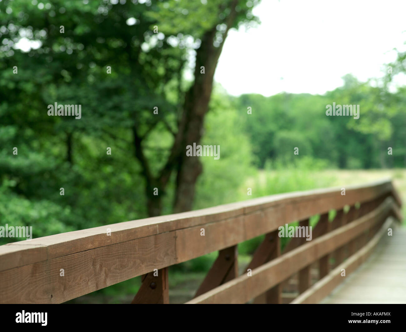 Wooden hand rail of bridge Stock Photo - Alamy