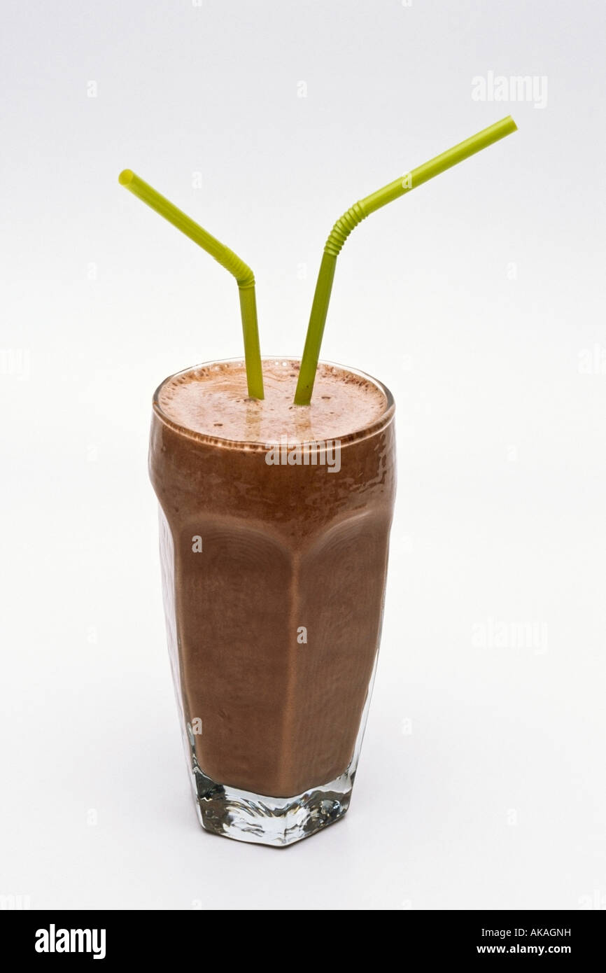 Milkshake with two straws Stock Photo - Alamy
