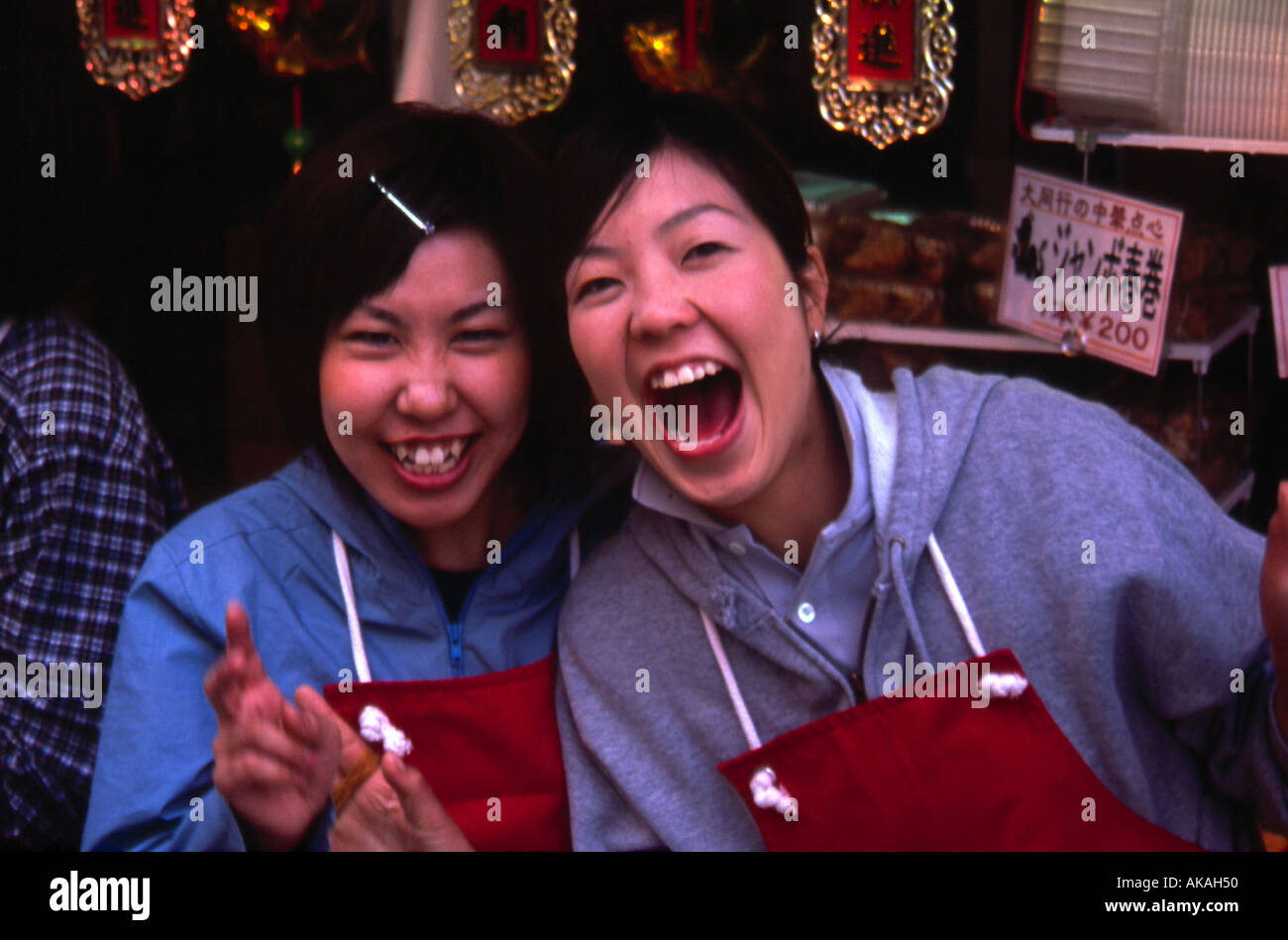 Japanese girls laughing Stock Photo - Alamy