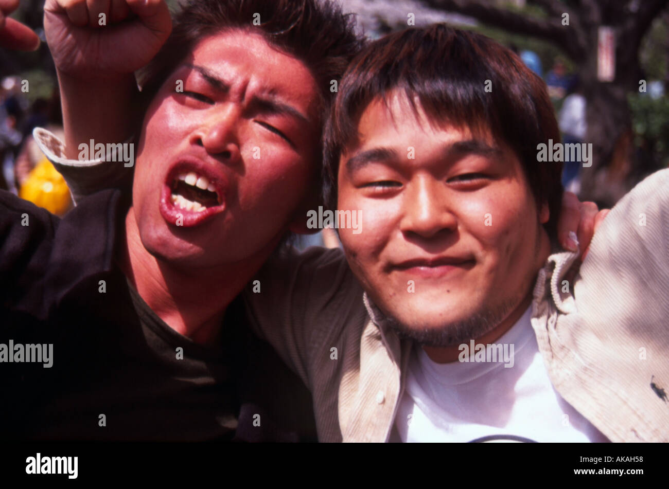 Teenagers pulling faces Japan Stock Photo - Alamy