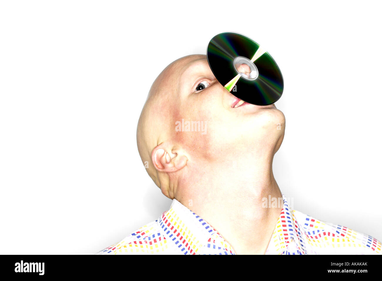 White bold male balancing compact disc cd on nose like a seal wearing ...