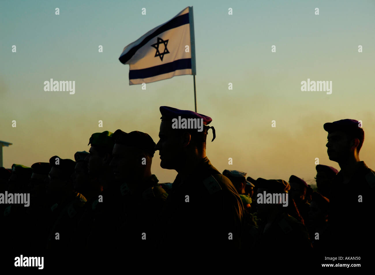 IDF soldiers with national flag flapping in the wind. Israel Stock ...