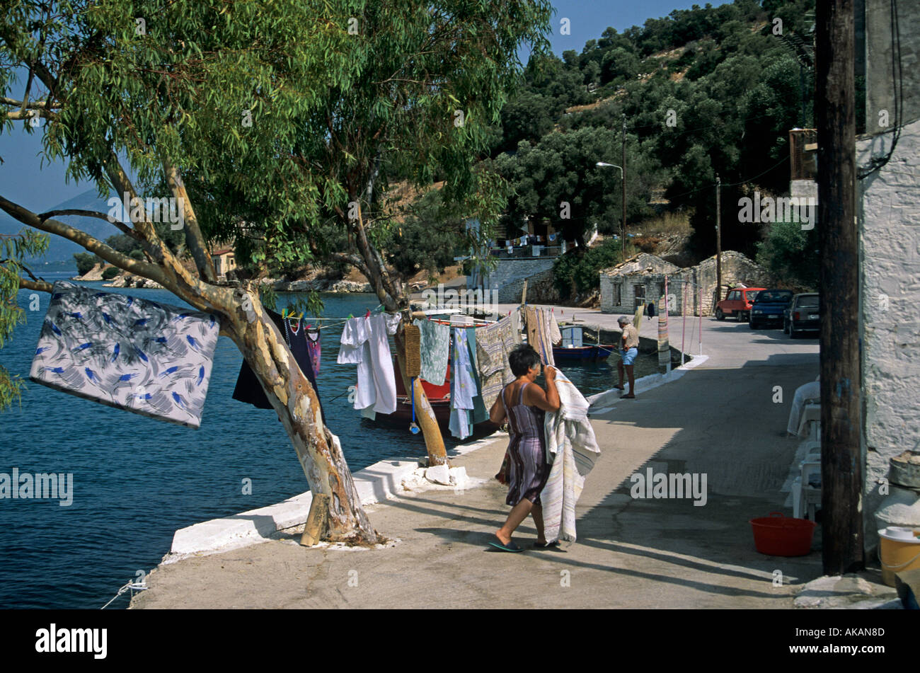 Greek woman washing hi-res stock photography and images - Alamy