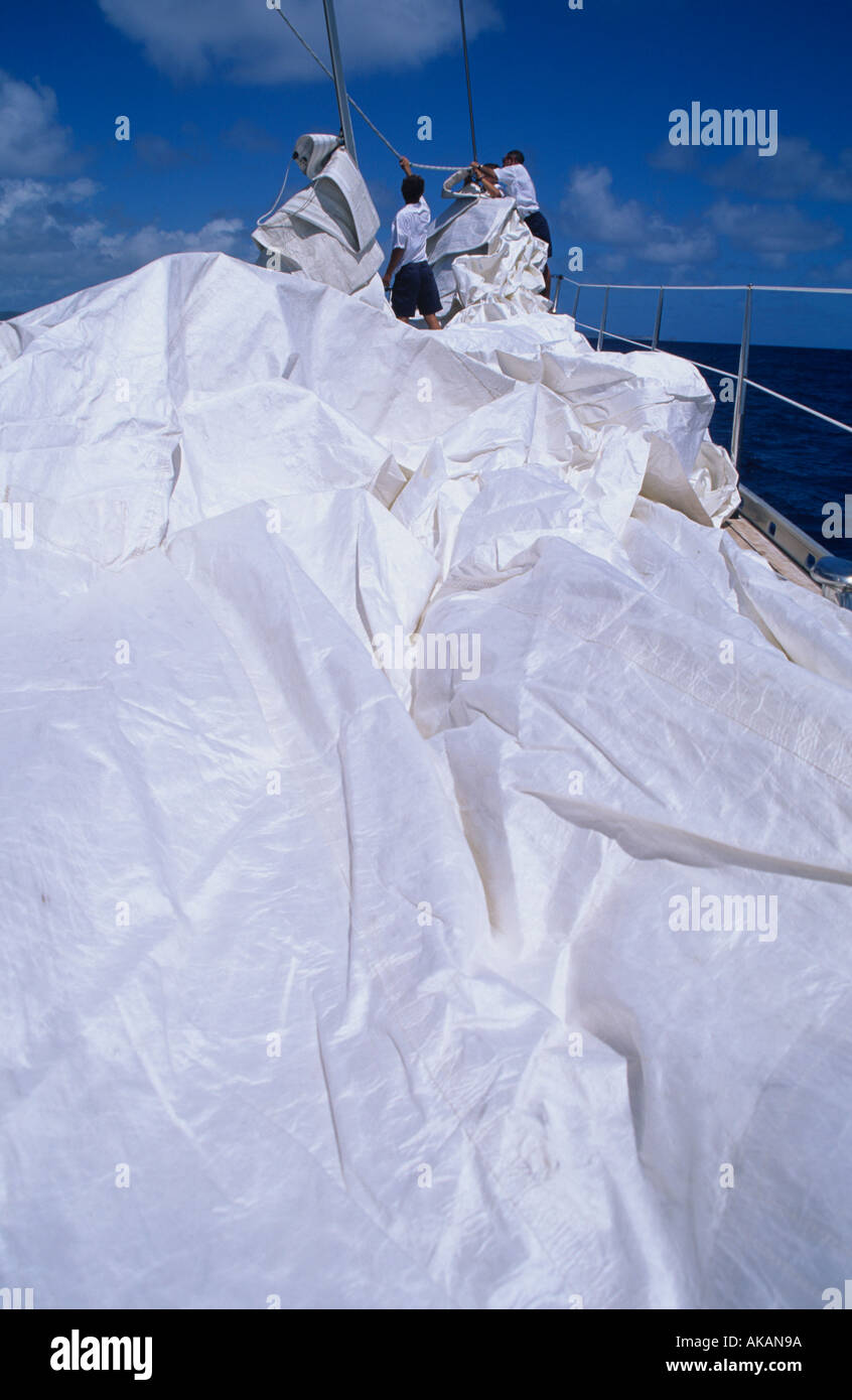 Changing the headsail on a large ketch Stock Photo - Alamy