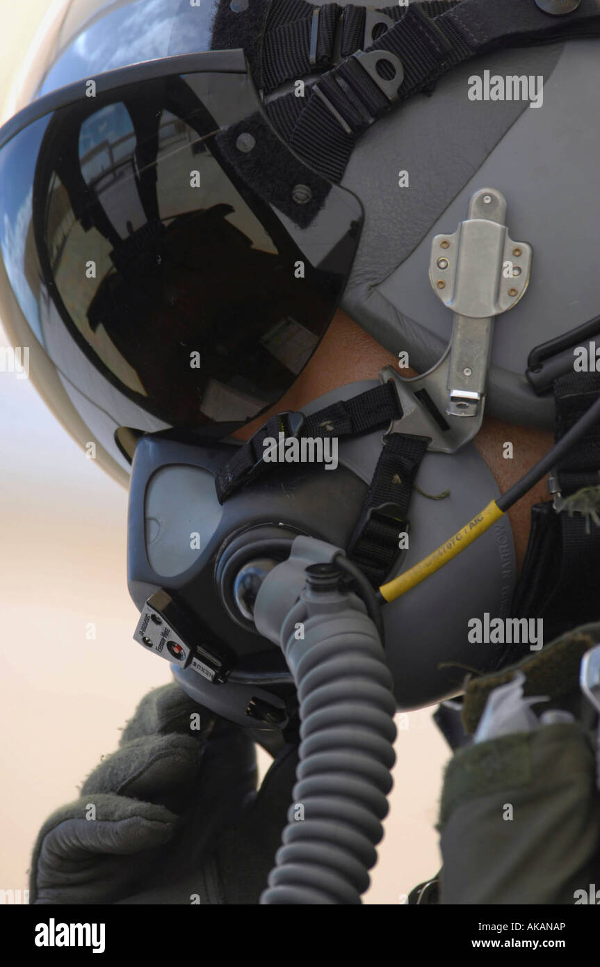 A pilot sits in an aircraft with an oxygen mask equipped Stock Photo ...