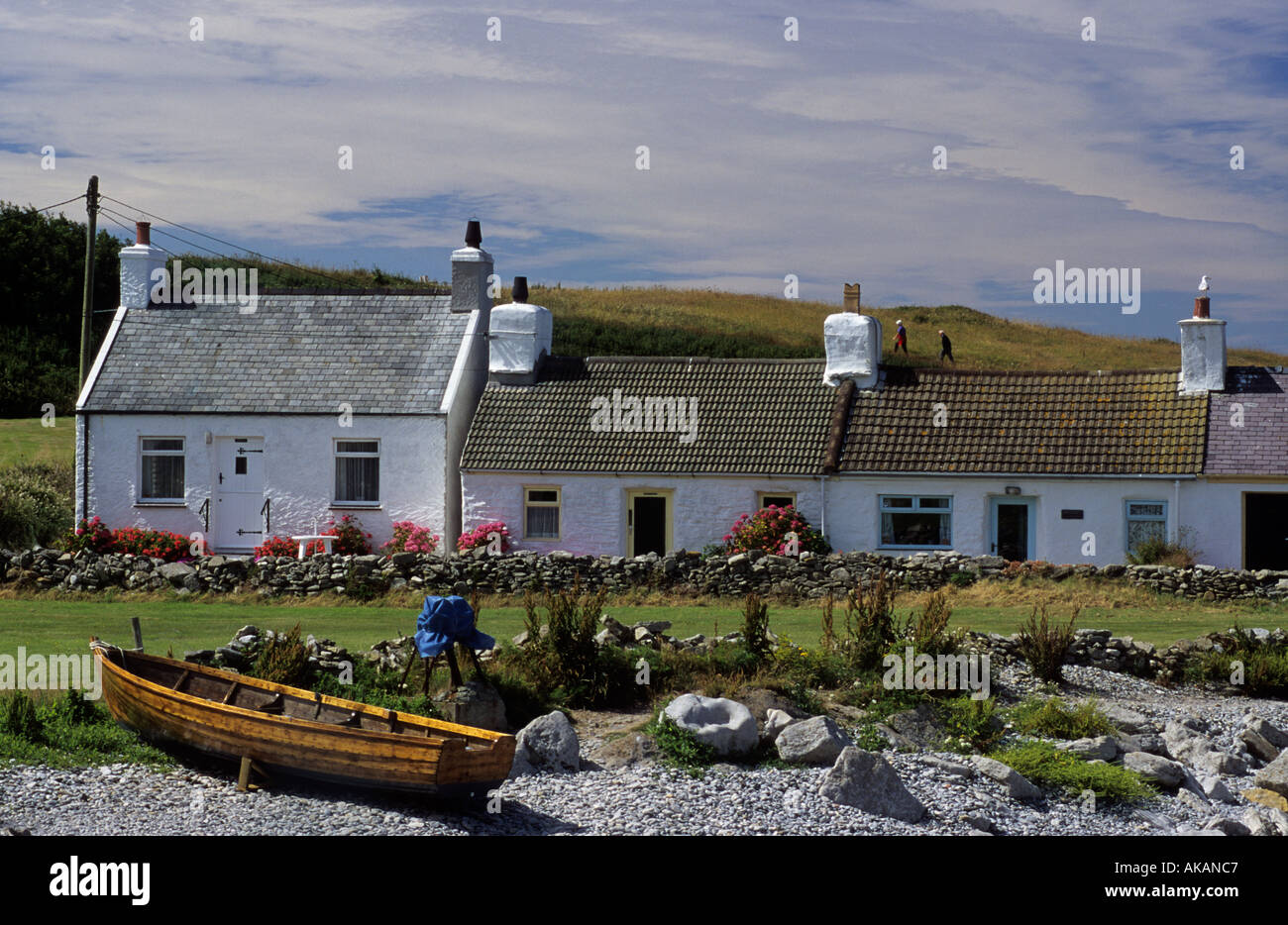 Cottage and boat, Moelfre, Anglesey, Wales, UK Stock Photo - Alamy