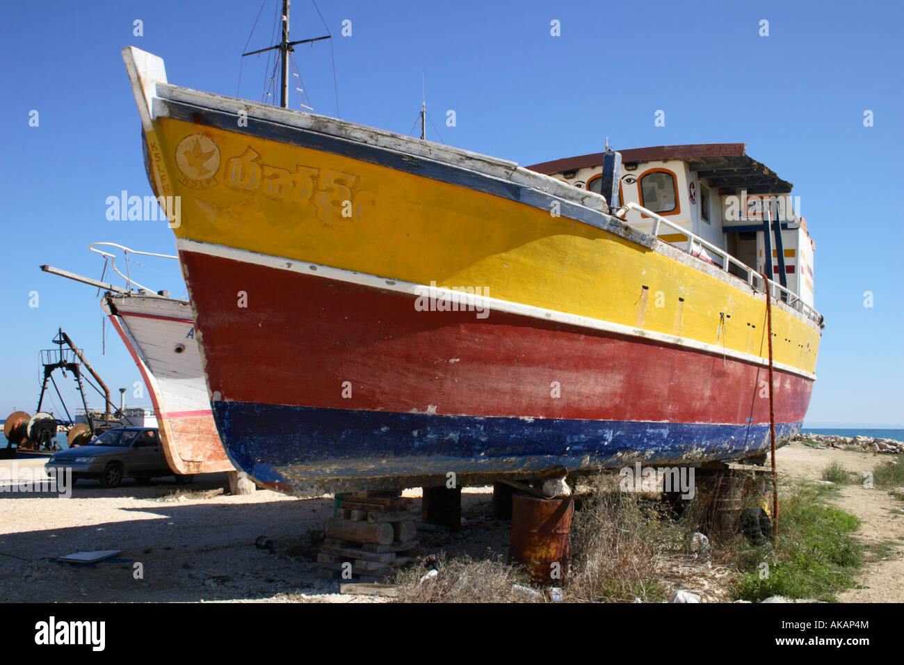A colourful traditional Greek boat in Zakynthos town harbour, Greece ...
