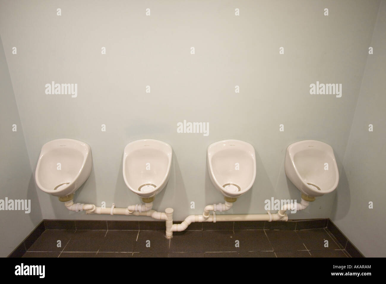 A gents urinal that is part of a waterless system using no water to ...