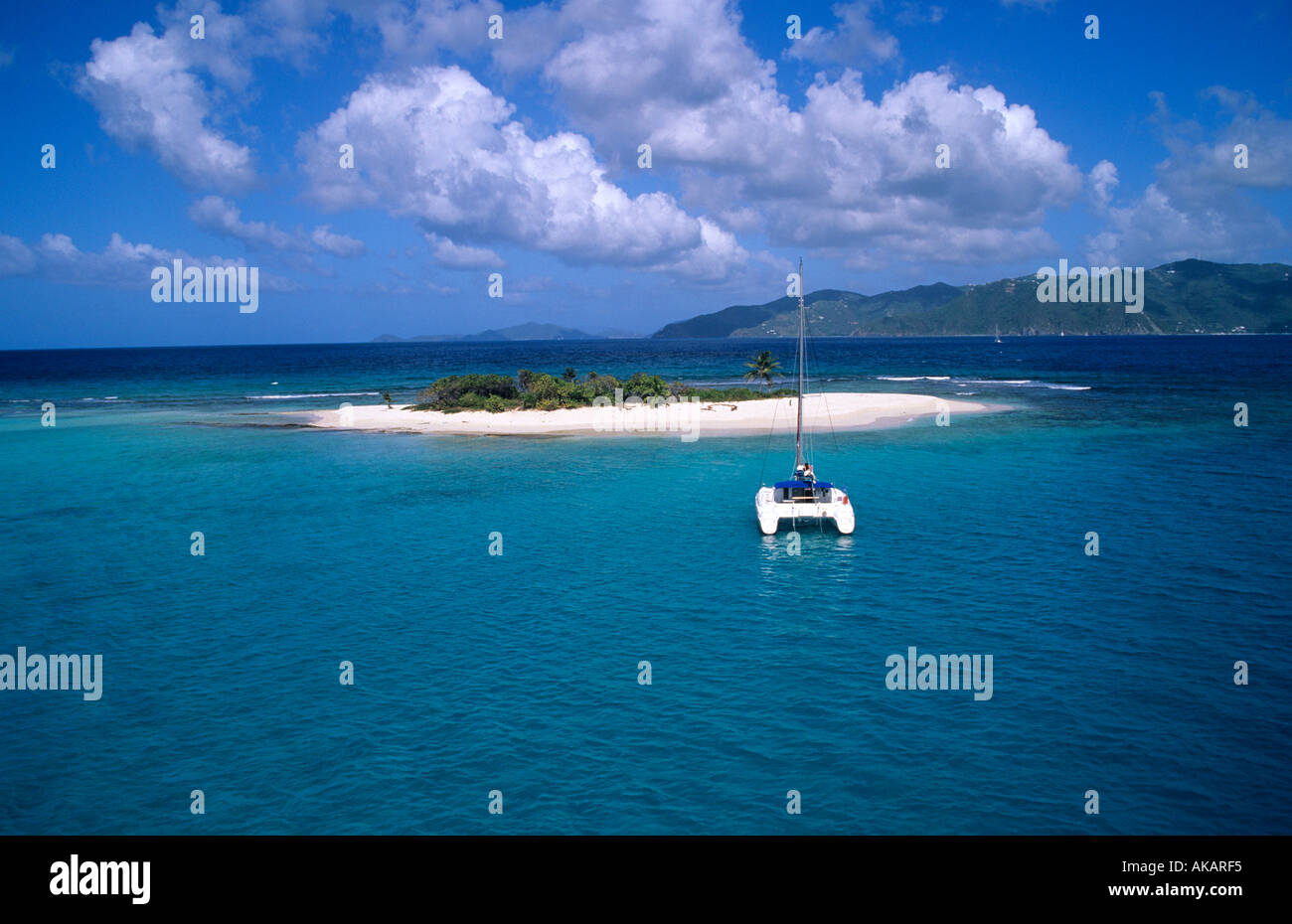 Sandy Spit British Virgin Islands Caribbean with catamaran anchored in ...