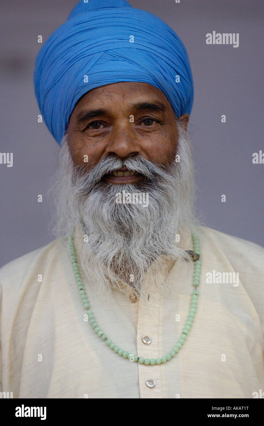 Holy man of Sikh religion. Blue turban within the Sikh religion denotes ...
