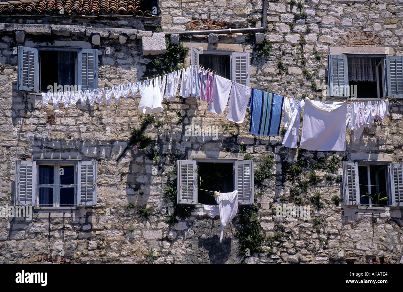 Laundry hanging outside on washing lines hi-res stock photography and ...