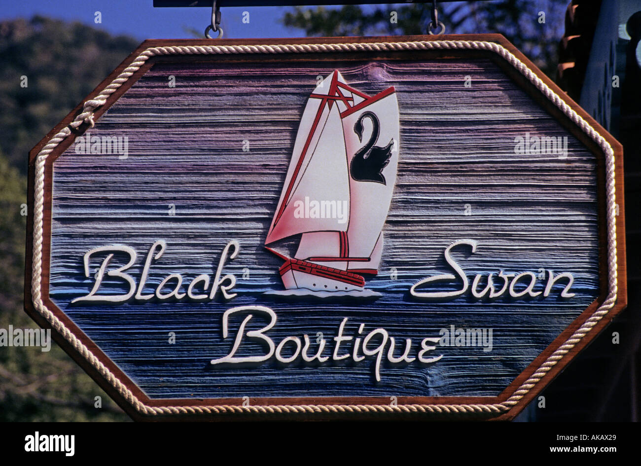 wooden Boutique shop sign Stock Photo - Alamy