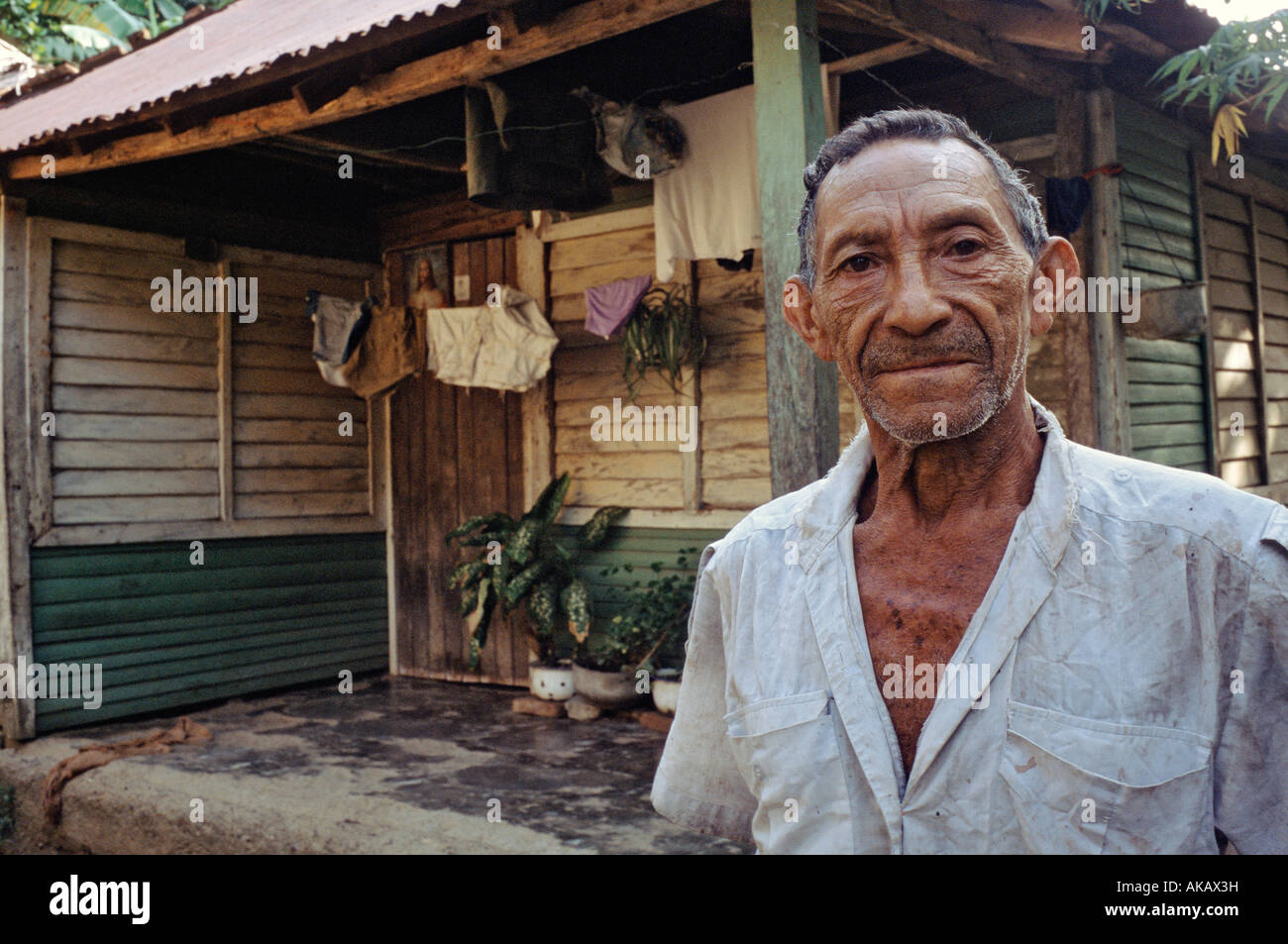 Portrait of an old man in front of his home in Guirito near Baracoa ...