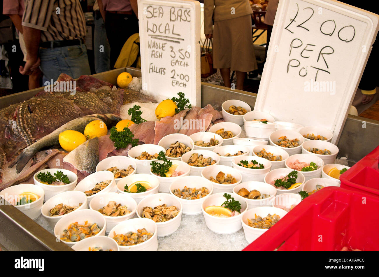 Fish and various seafood in pots on market stall at Mersea Seafood ...